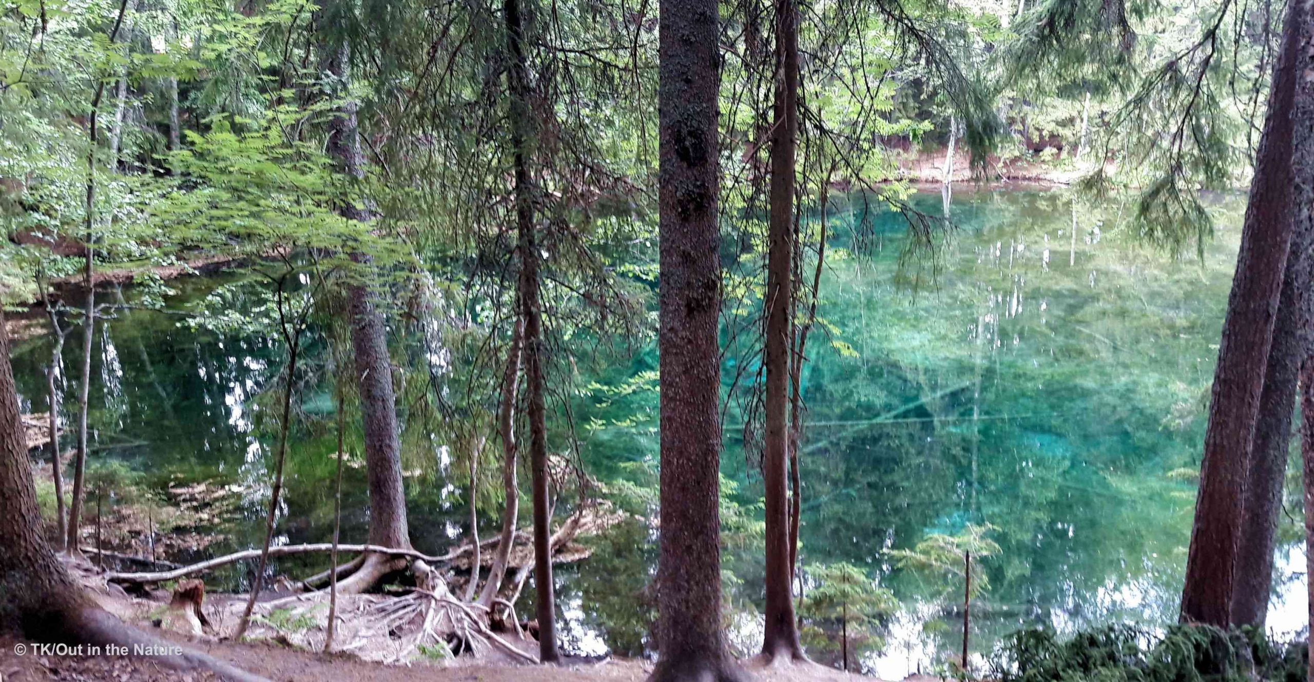 Stunning turquoise natural spring Kiikunlähde at Hollola